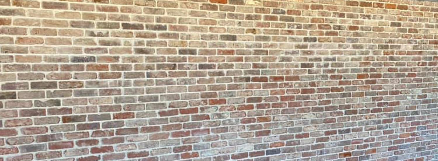 Recycled Red Brick Feature Wall - Perth Showroom | Halls Construction